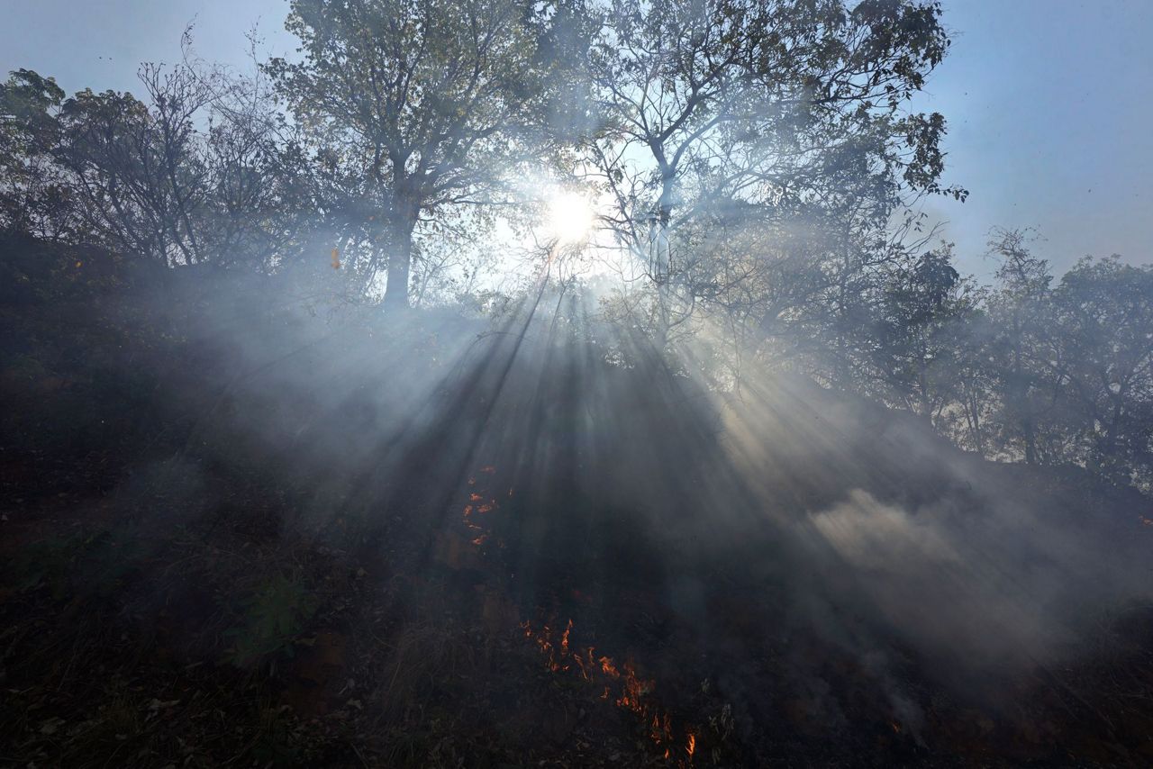 Brazil’s firefighters battle wildfires raging during rare late-winter ...
