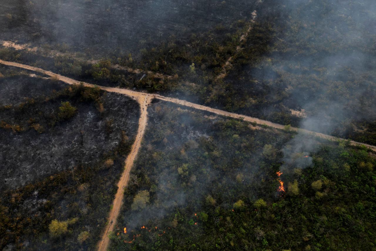 Brazil’s firefighters battle wildfires raging during rare late-winter ...