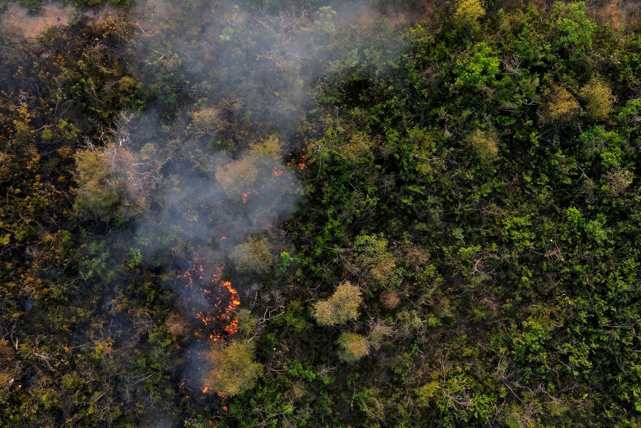 Brazil’s firefighters battle wildfires raging during rare late-winter ...