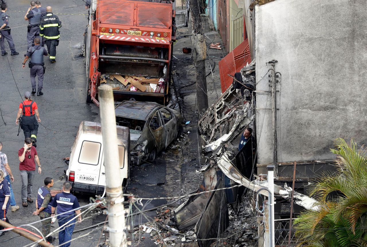 Plane crashes in Sao Paulo neighborhood, 2 dead, 12 injured