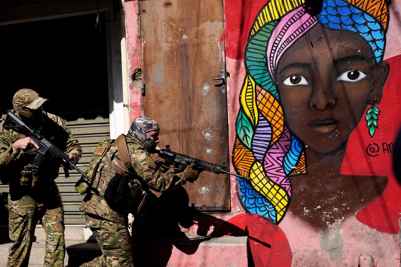 Rio de Janeiro police conduct deadly raid in Alemao favelas