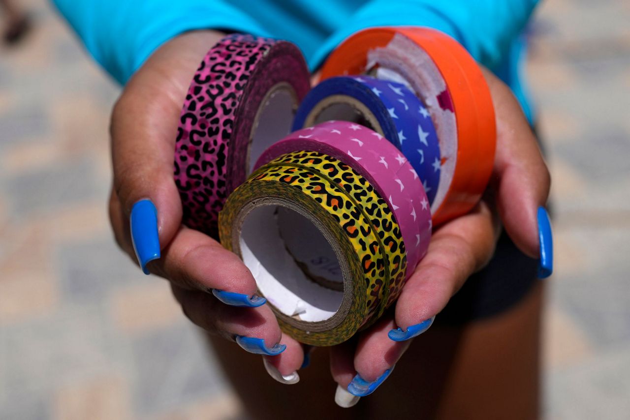 Perfect tans, less COVID cares on Rio de Janeiro rooftop