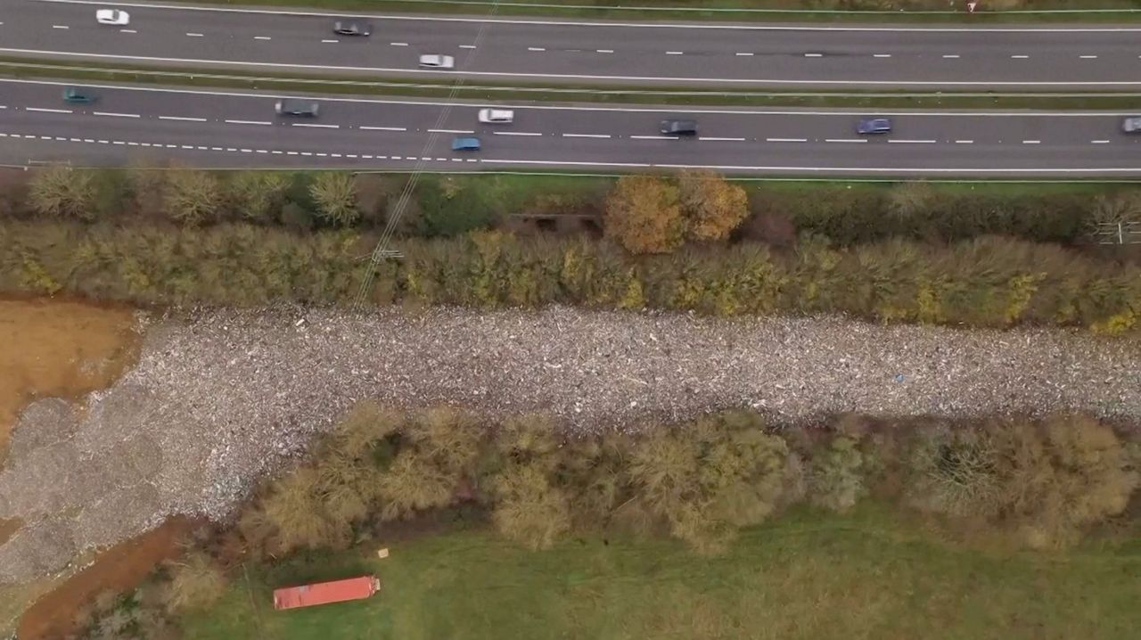 Mountain of illegally dumped trash near Oxford river causes outcry in ...