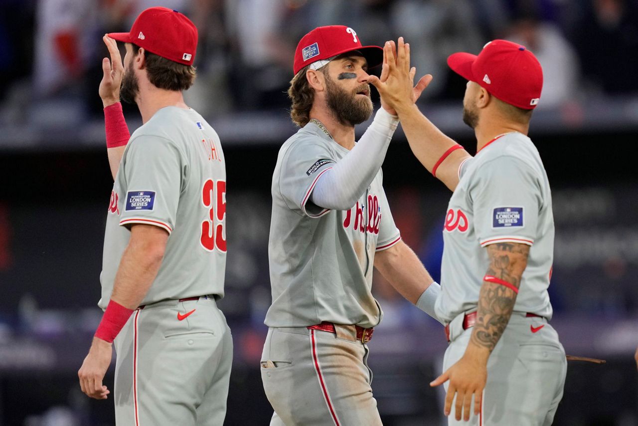 Phillies' Bryce Harper does soccer slide after homer in win over Mets ...