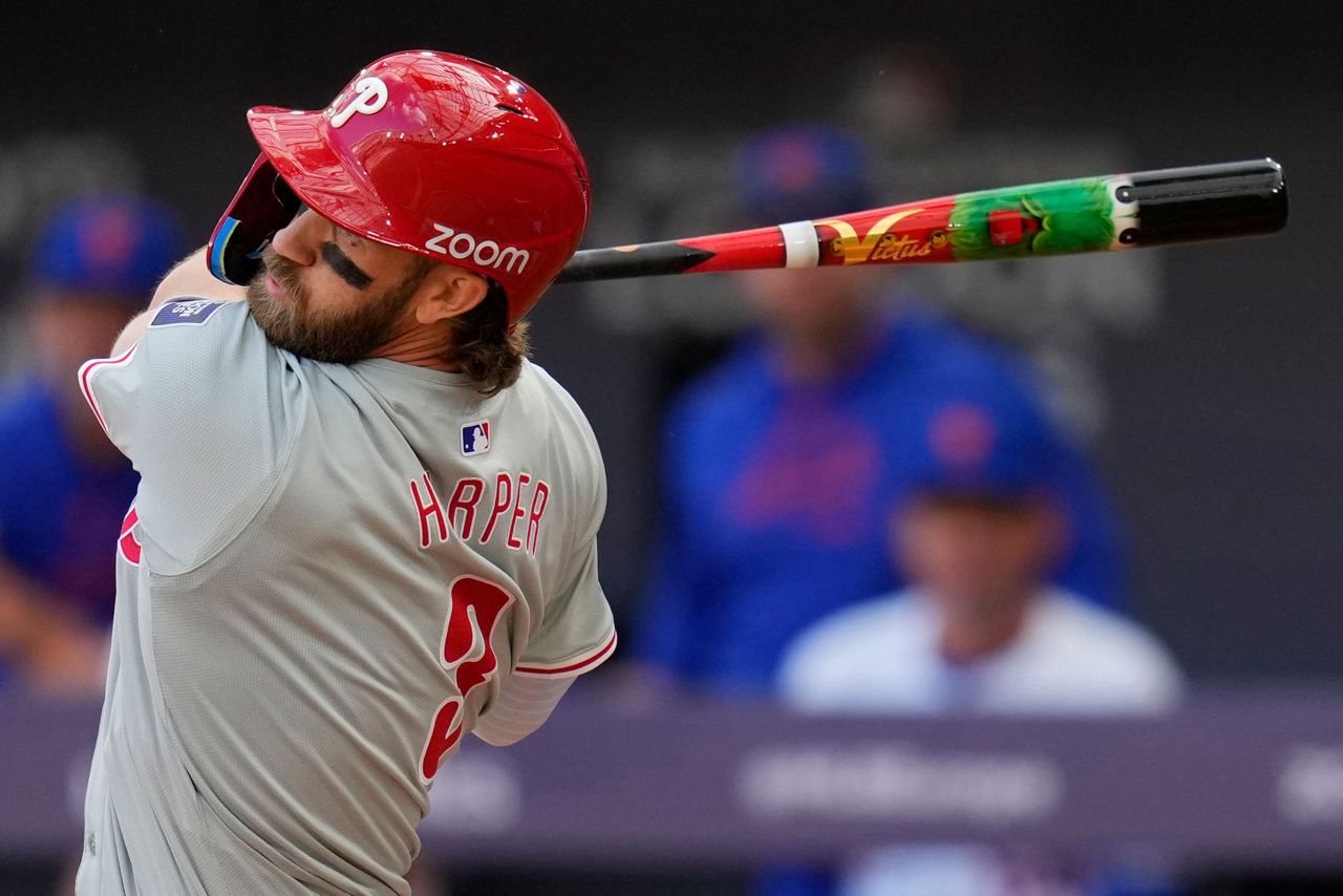 Phillies' Bryce Harper does soccer slide after homer in win over Mets ...