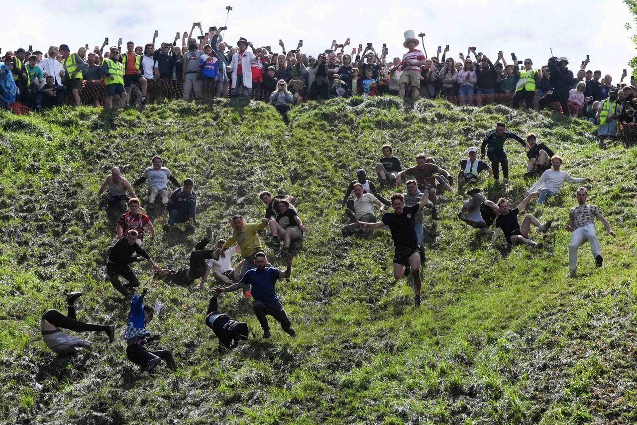 Chasing cheese wheels or lugging sacks of wool, UK competitors embrace ...