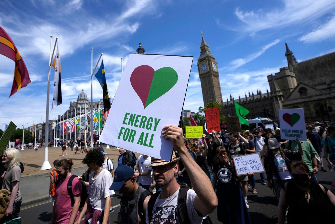 Protesters in UK decry climate change after record heat wave