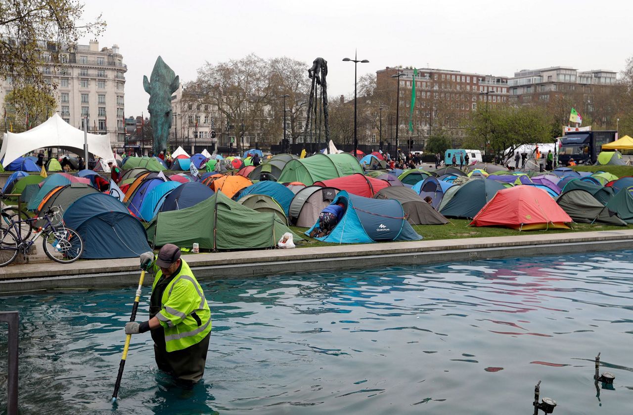 UK police arrest more than 100 in climate change protests