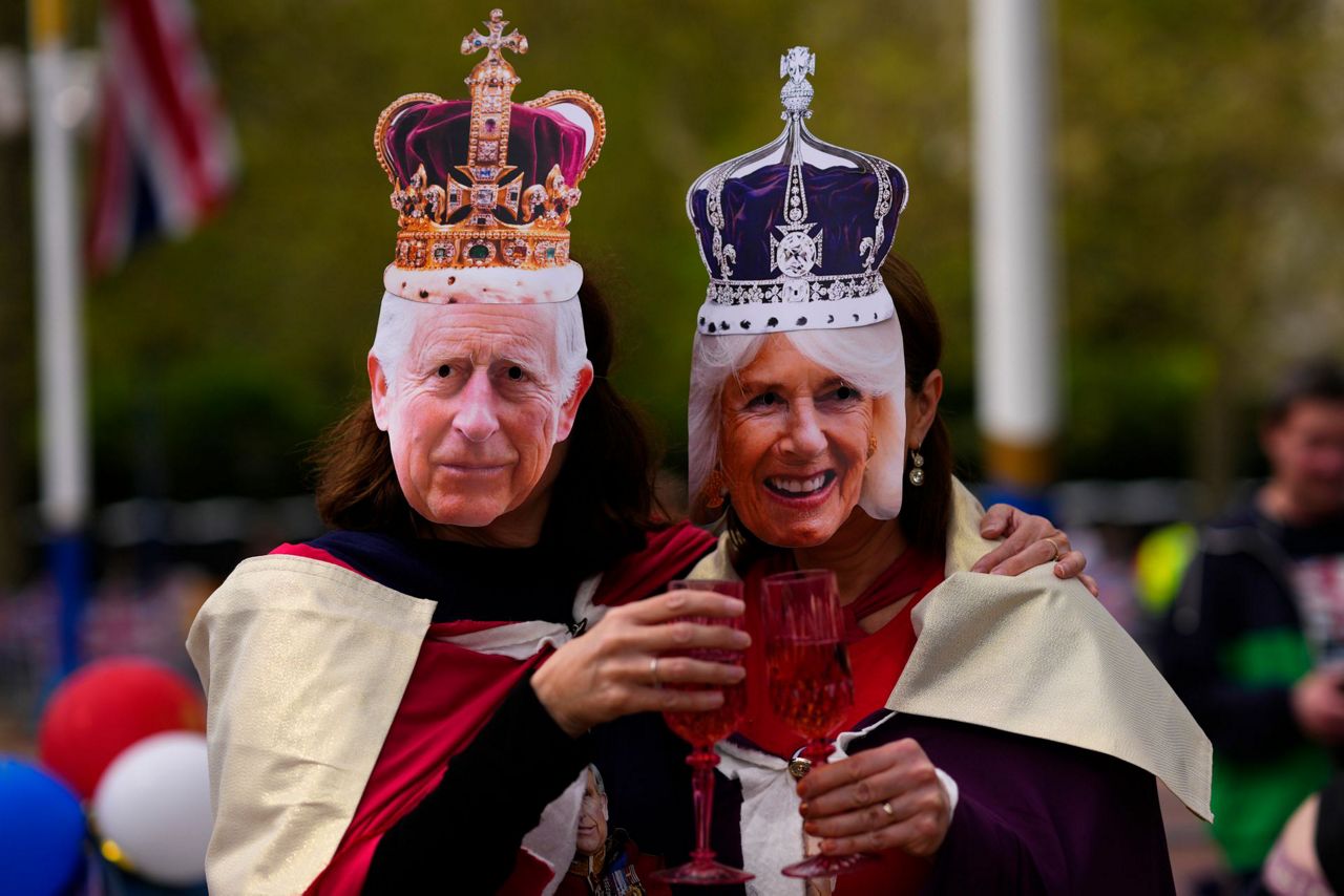 King Charles III surprises crowd outside Buckingham Palace