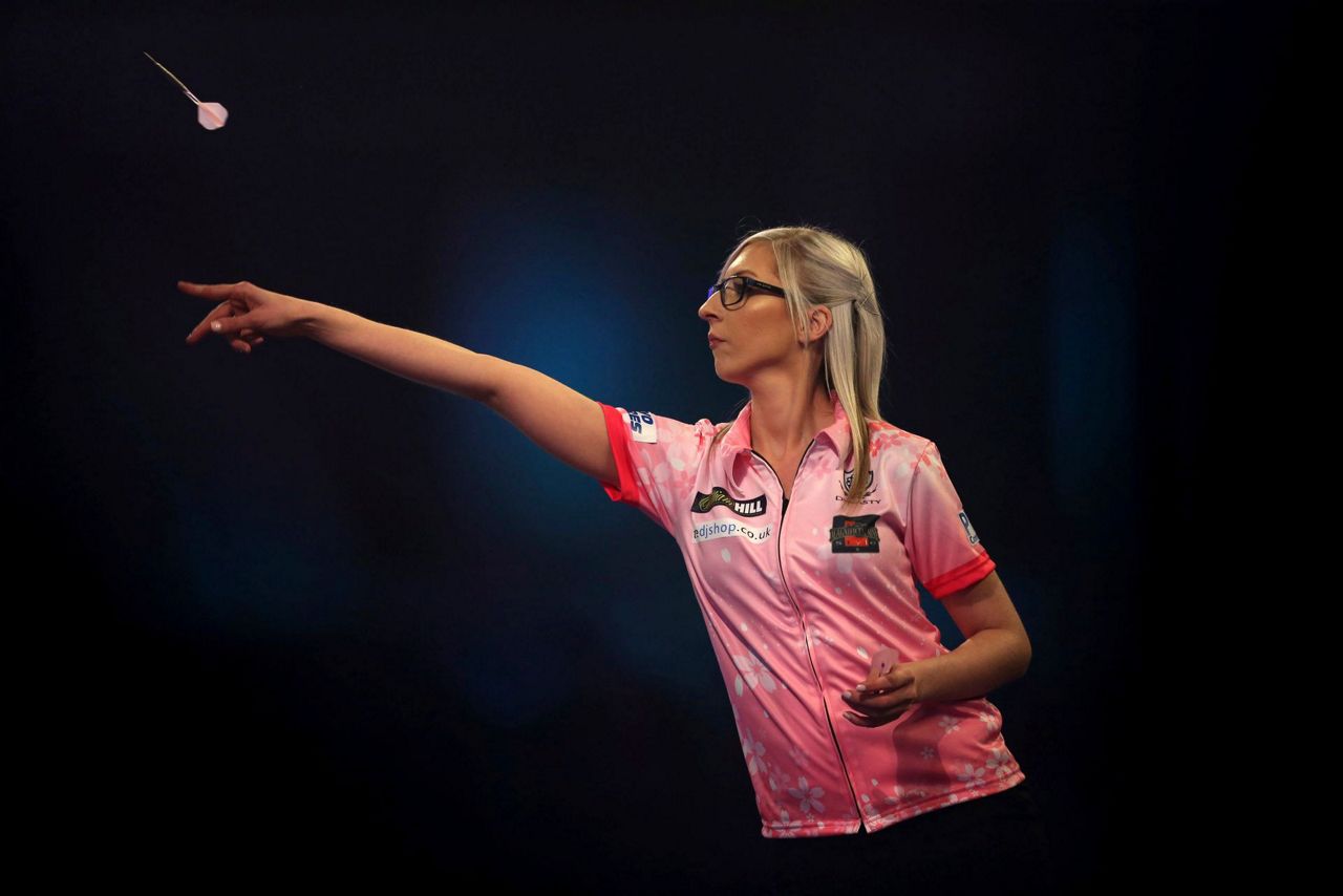 Female darts player makes history at world championship