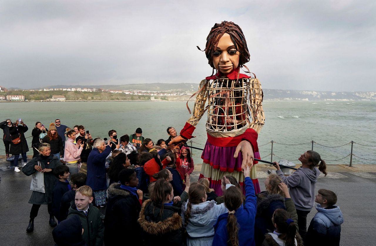 Puppet Little Amal arrives in UK after journey across Europe