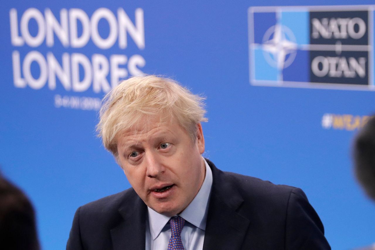 UK’s Boris Johnson juggles NATO summit with electioneering