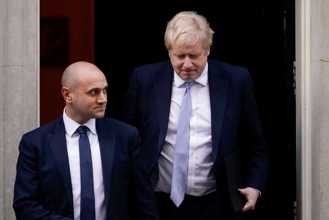Boris Johnson tries to change subject from 'partygate' woes