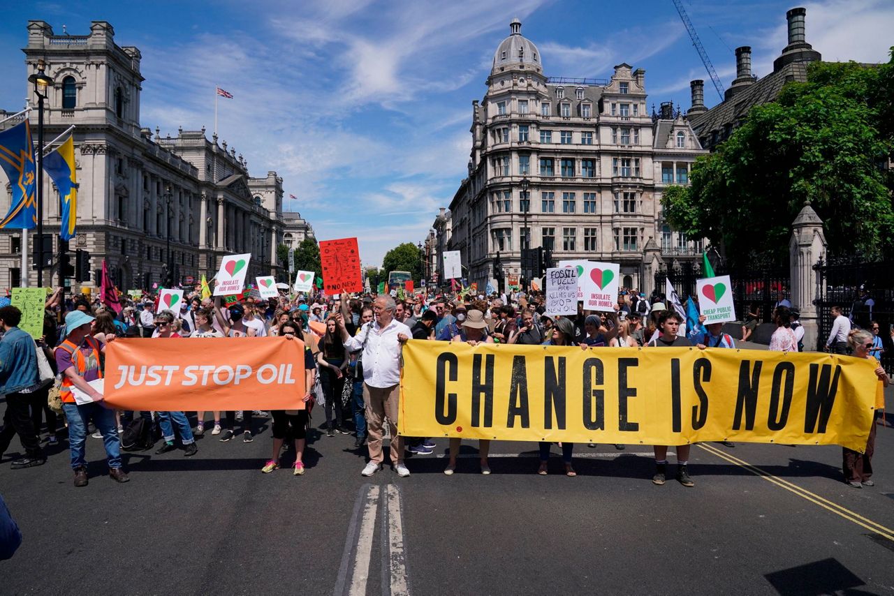 Protesters in UK decry climate change after record heat wave