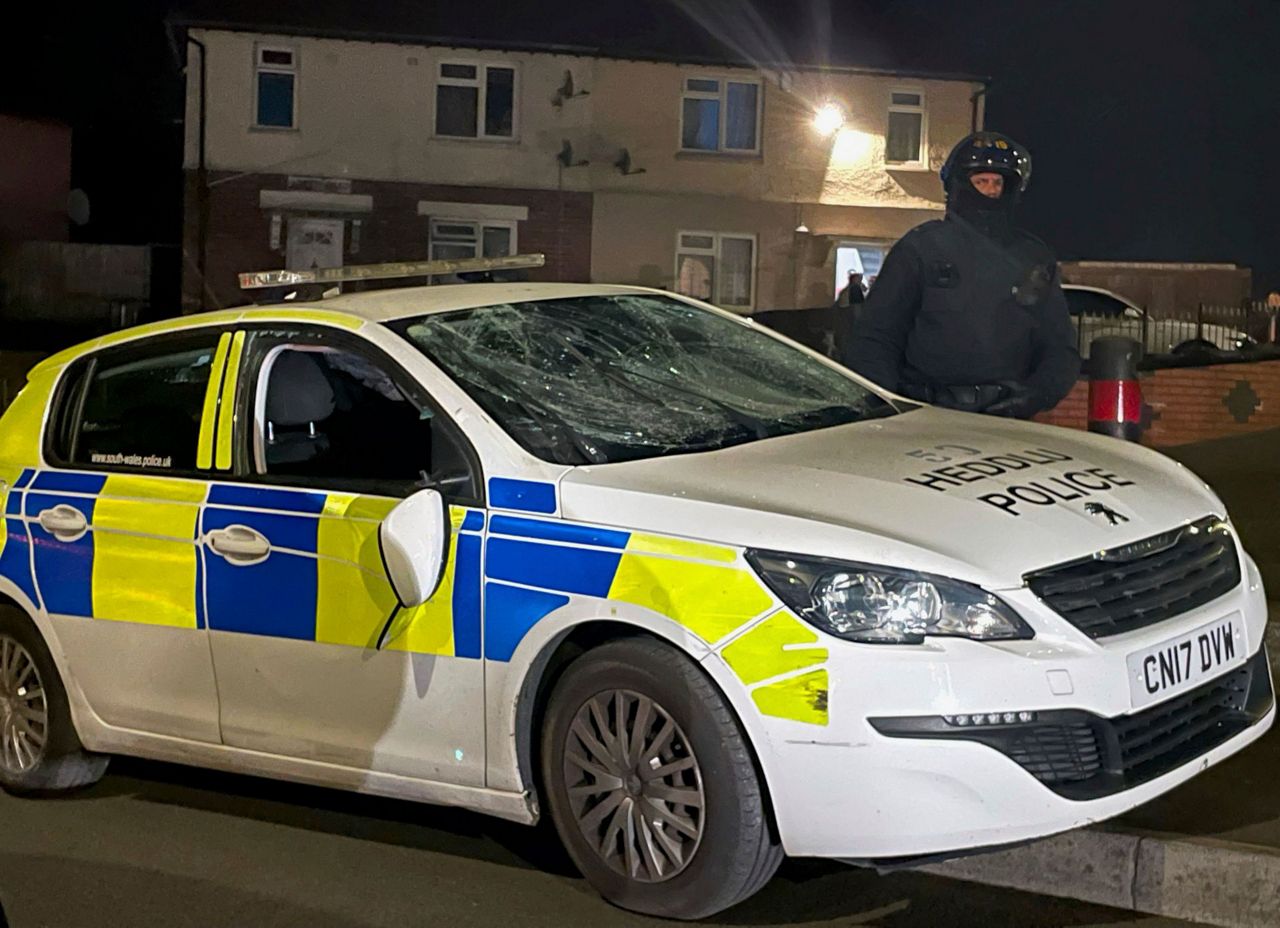 Cars set on fire in Welsh capital as police face 'large scale disorder'