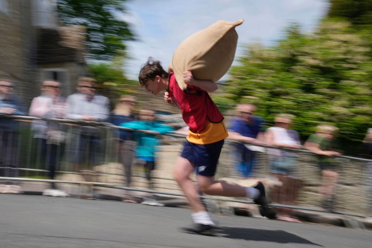 Chasing cheese wheels or lugging sacks of wool, UK competitors embrace ...
