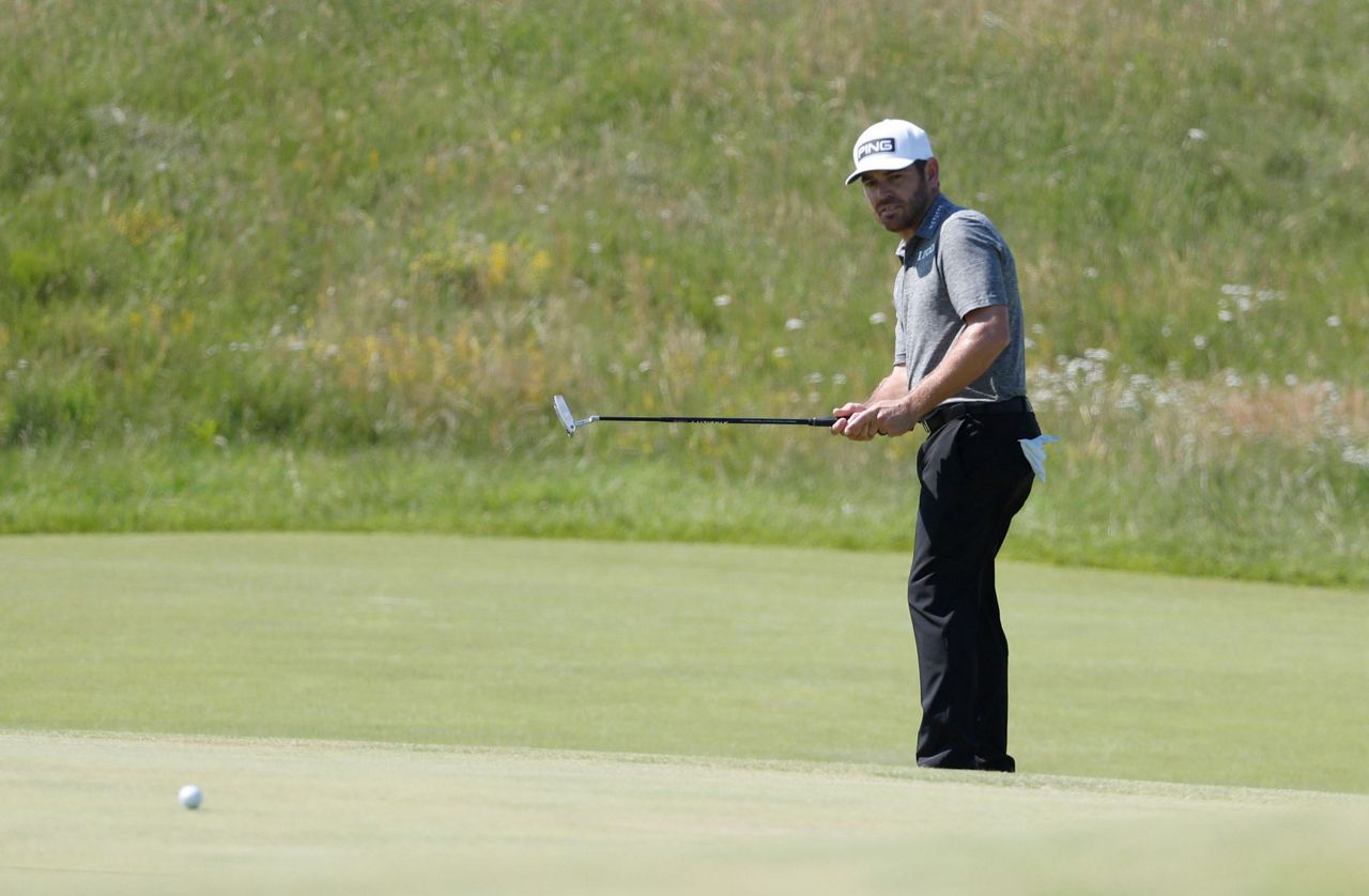 The Latest: Balmy conditions for final round of British Open