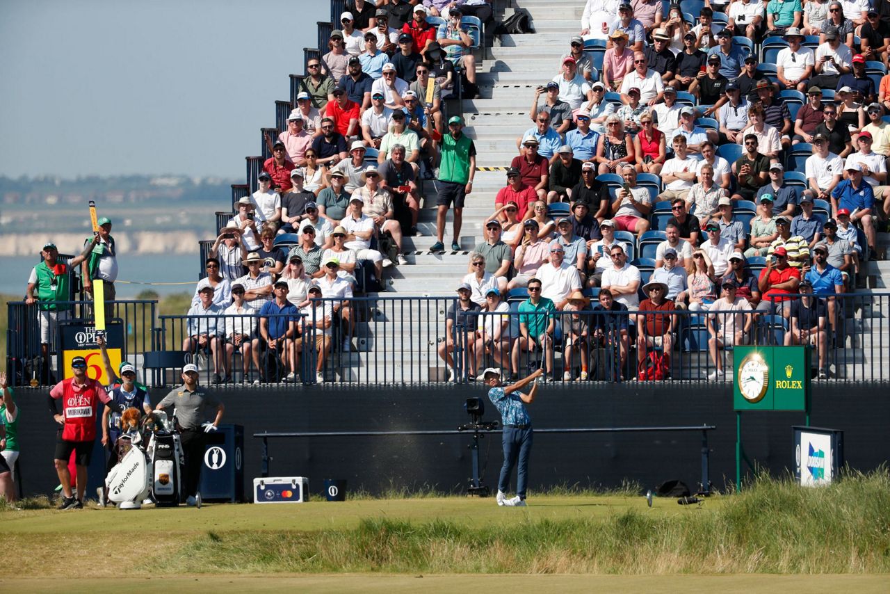 The Latest: Balmy conditions for final round of British Open