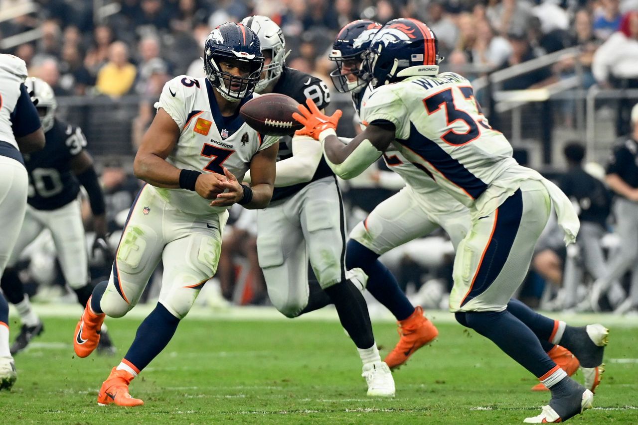 AP source: Javonte Williams out for year with torn ACL