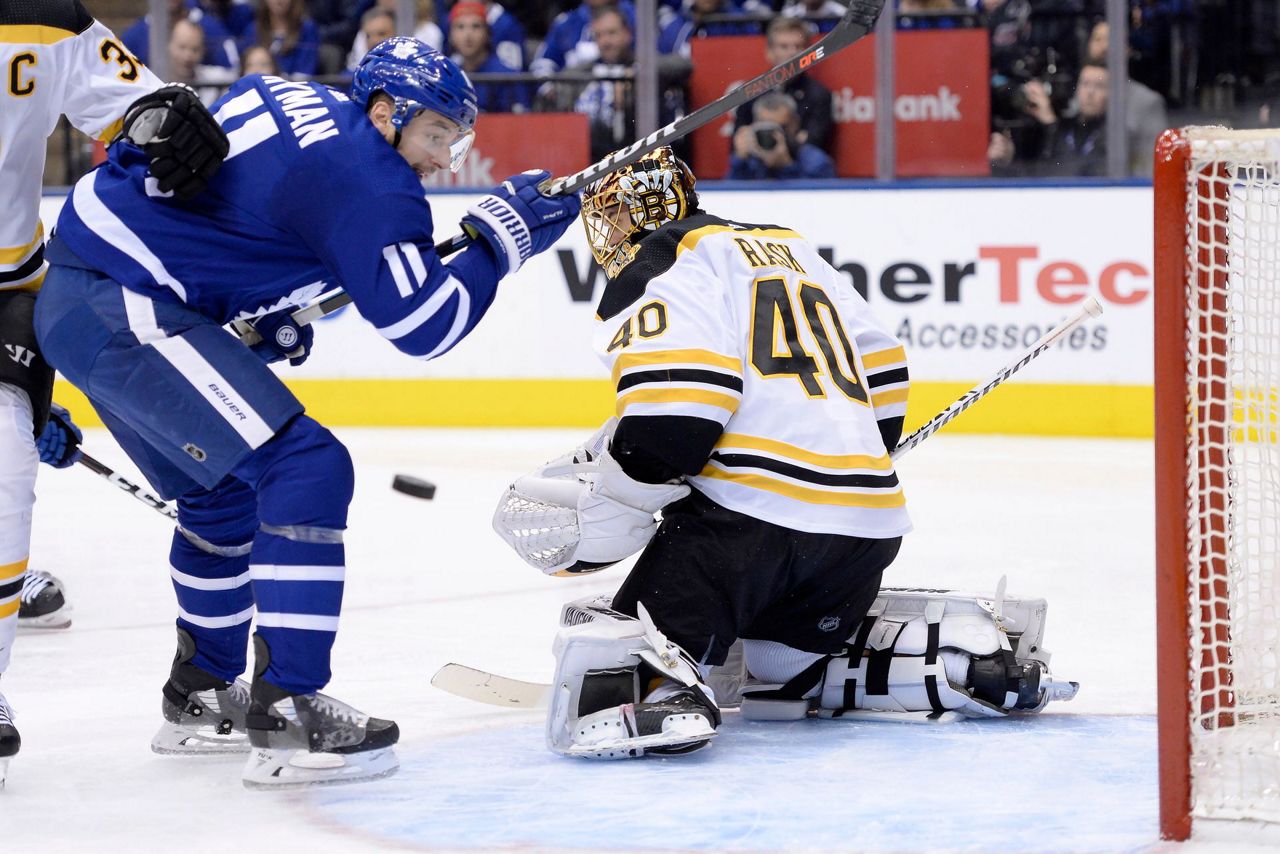 Marchand helps Bruins beat Maple Leafs 4-2 to force Game 7