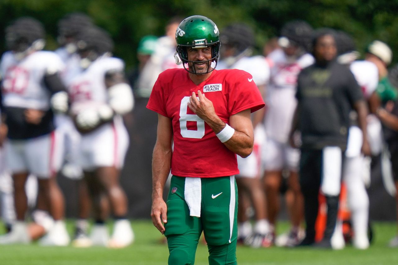 The big men in front of Aaron Rodgers have become the center of ...