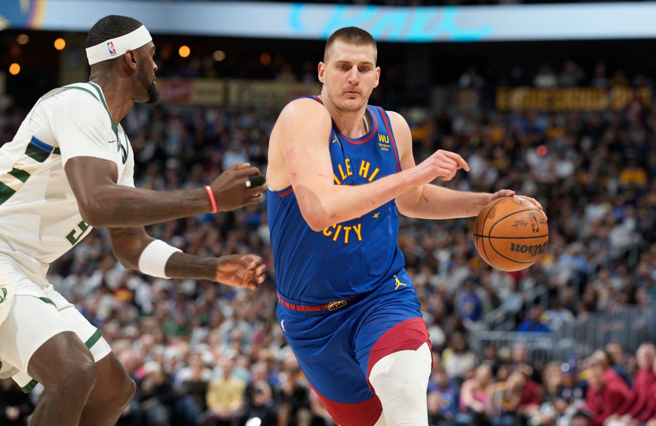 76ers' Embiid sitting out showdown with Nuggets' Jokic