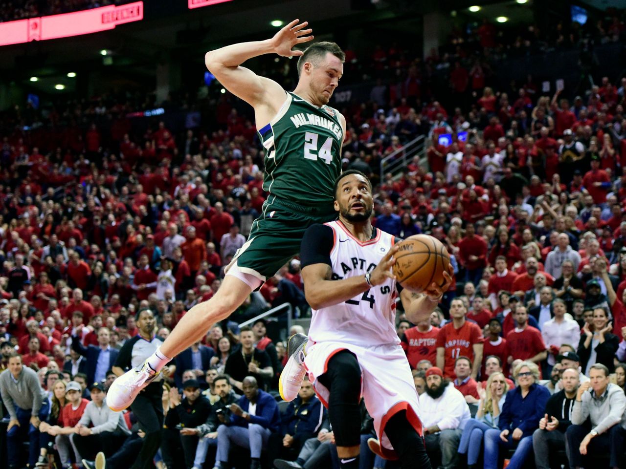 Lowry has 25, Raptors rout Bucks 120-102 to even East finals