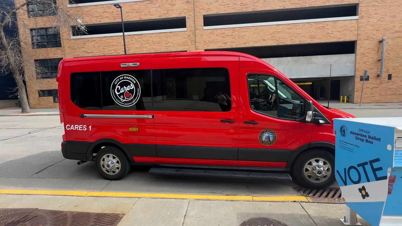 Madison CARES team celebrates receiving four new vans