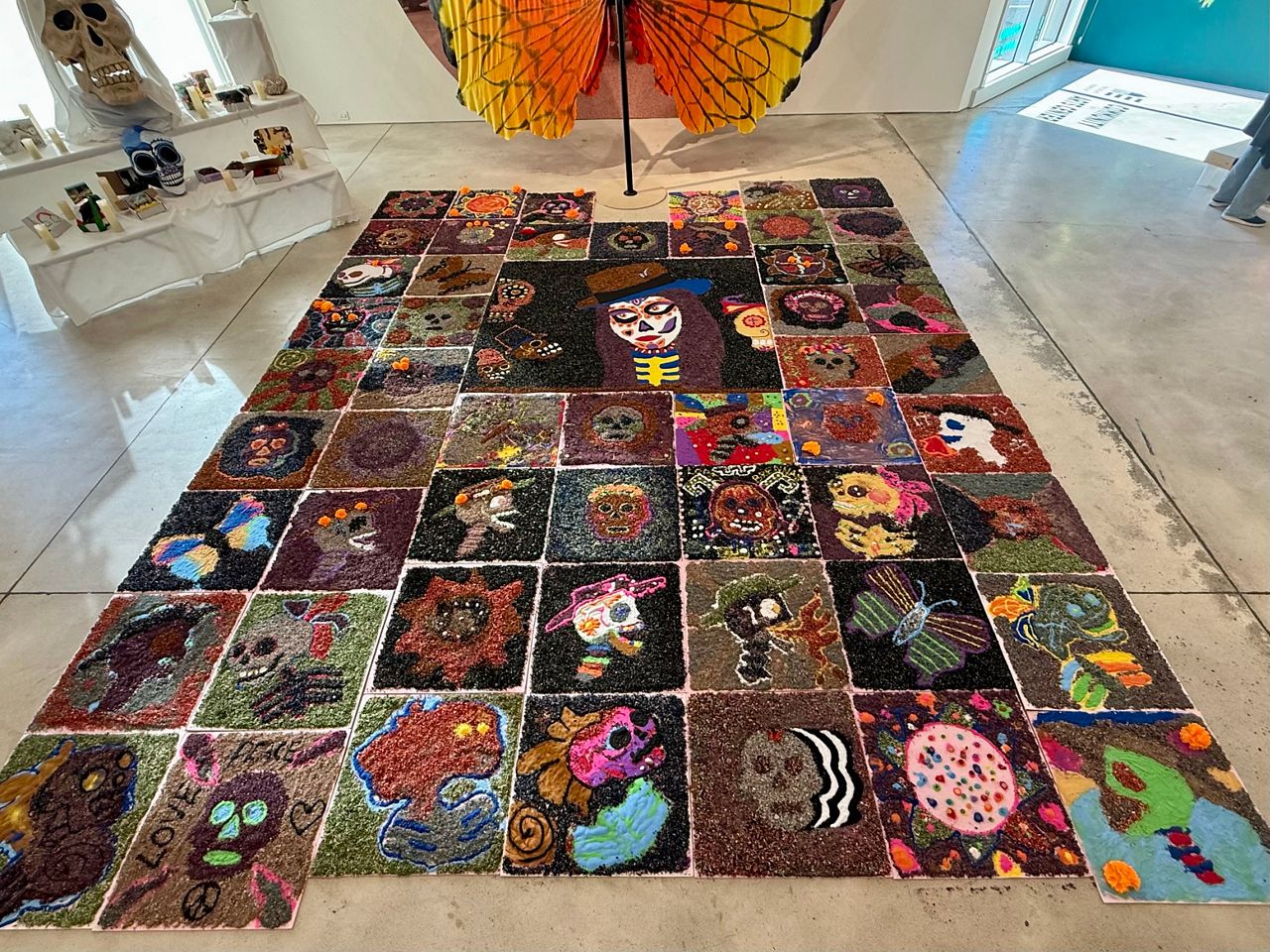 Day of the Dead sawdust carpets, altars celebrate tradition