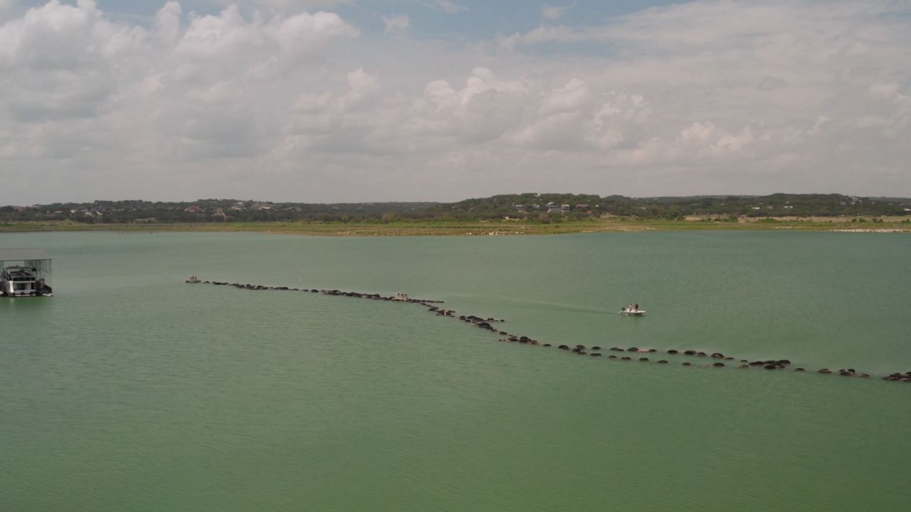 Devastating floodwater makes Canyon Lake rise