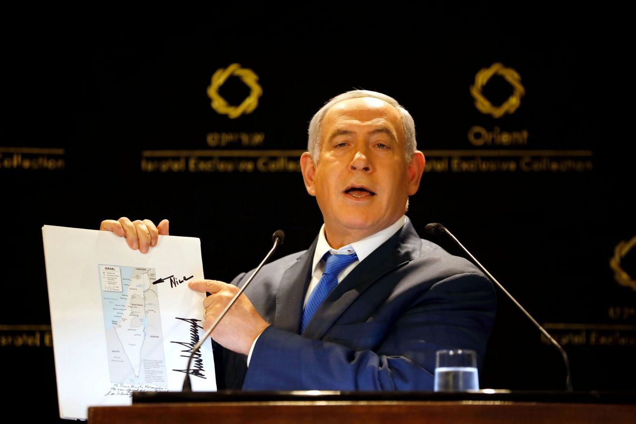 Netanyahu shows off Trump's map of Israel with Golan Heights