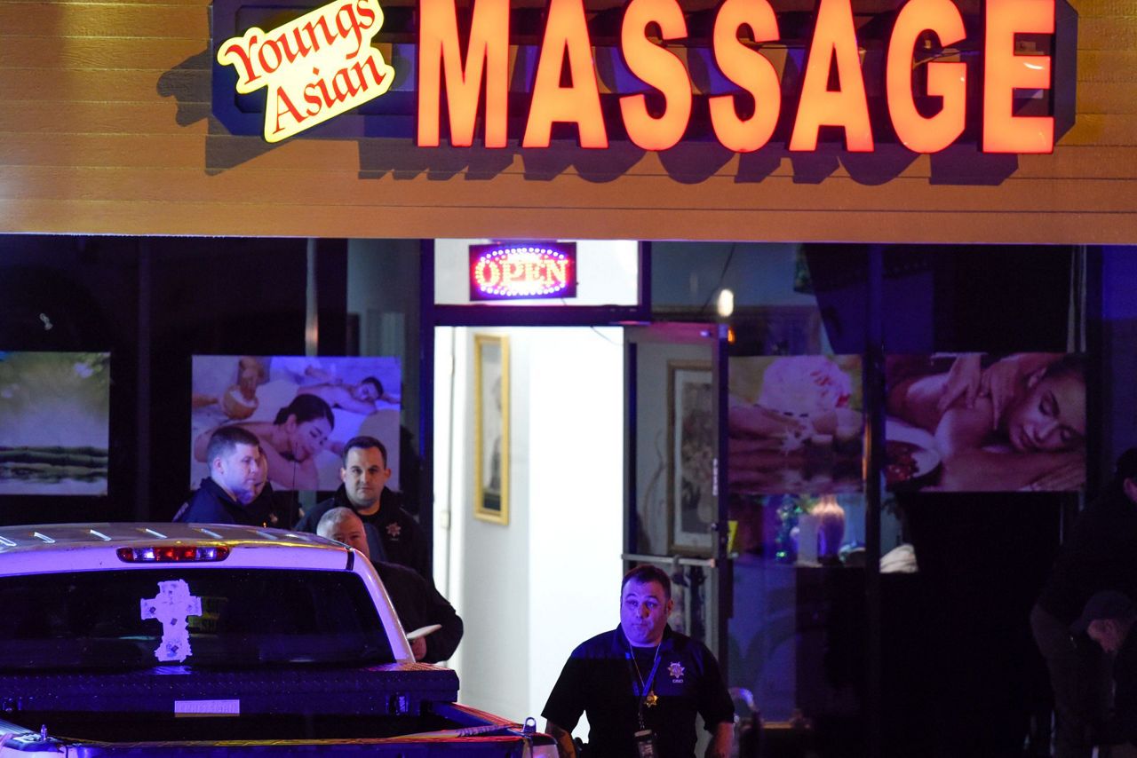Georgia massage parlor shootings leave 8 dead; man captured