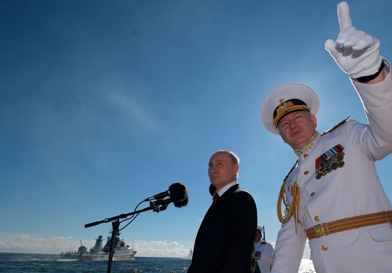 Putin attends naval parade, promises new ships to navy