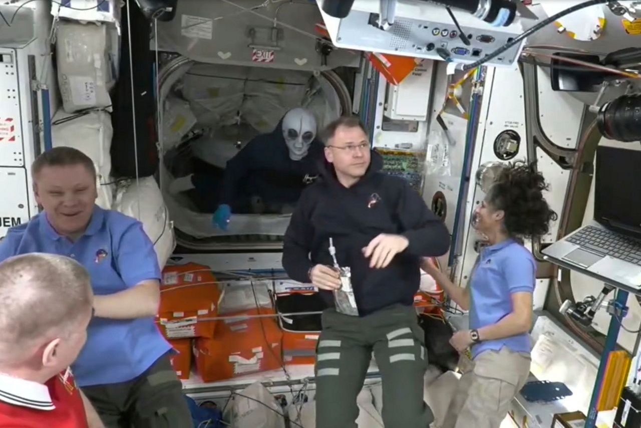 NASA's stuck astronauts welcome their newly arrived replacements to the space station
