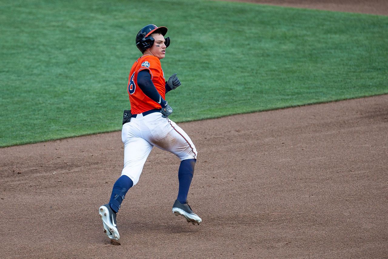 Michaels, Abbott lead Virginia past Vols 6-0 in CWS opener