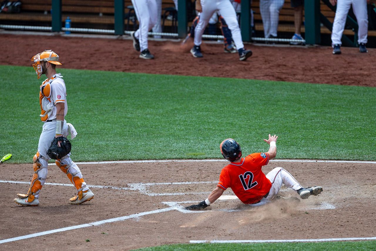 Michaels, Abbott lead Virginia past Vols 6-0 in CWS opener