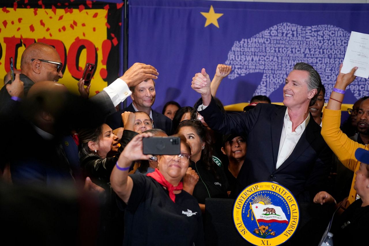 California Gov. Gavin Newsom signs law to raise minimum wage for fast ...