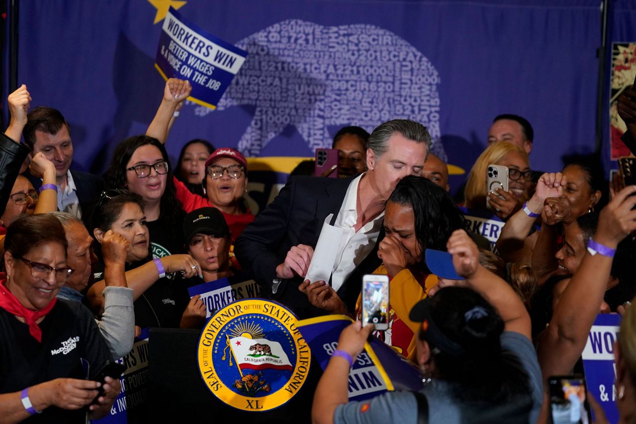 California Gov. Gavin Newsom signs law to raise minimum wage for fast ...