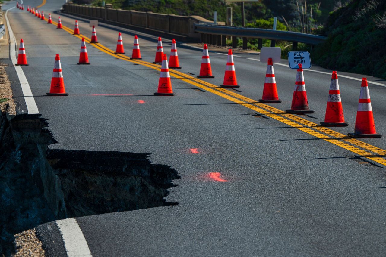 Motorists creep along 1 lane after part of California's iconic Highway ...