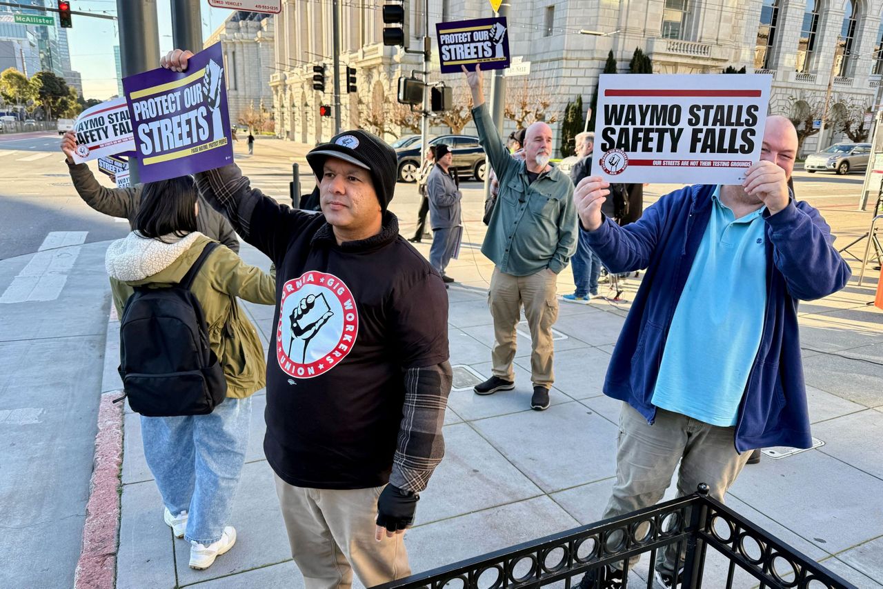 Lyft and Uber drivers protest Waymo robotaxis as California considers ...