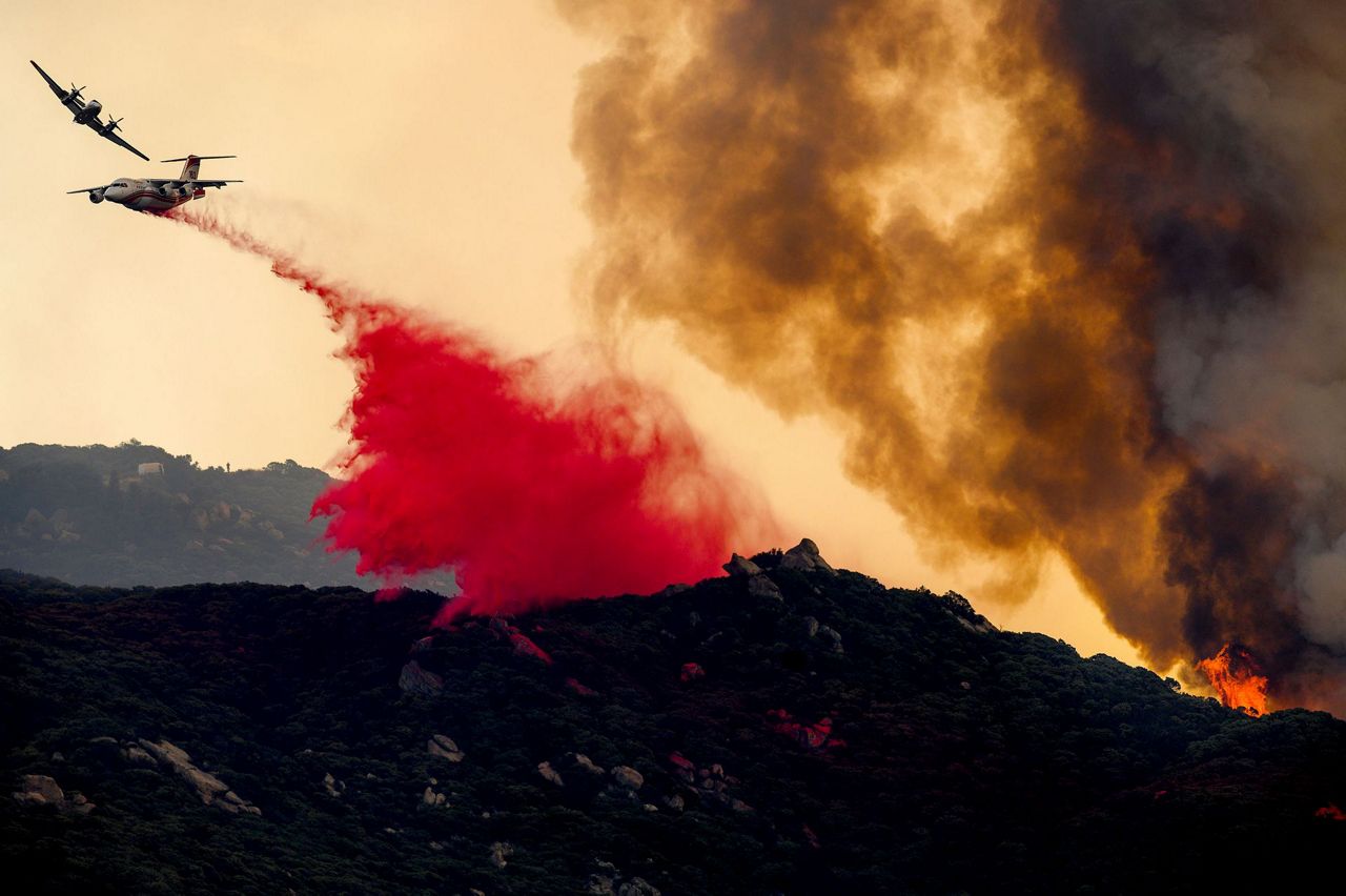 Rain douses California wildfire amid debris flow concerns