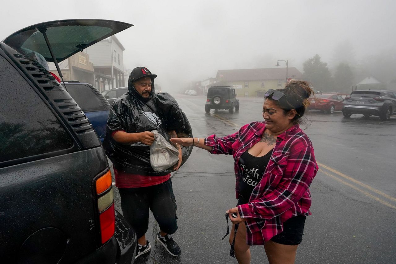 California weather helps firefighters but unleashes floods