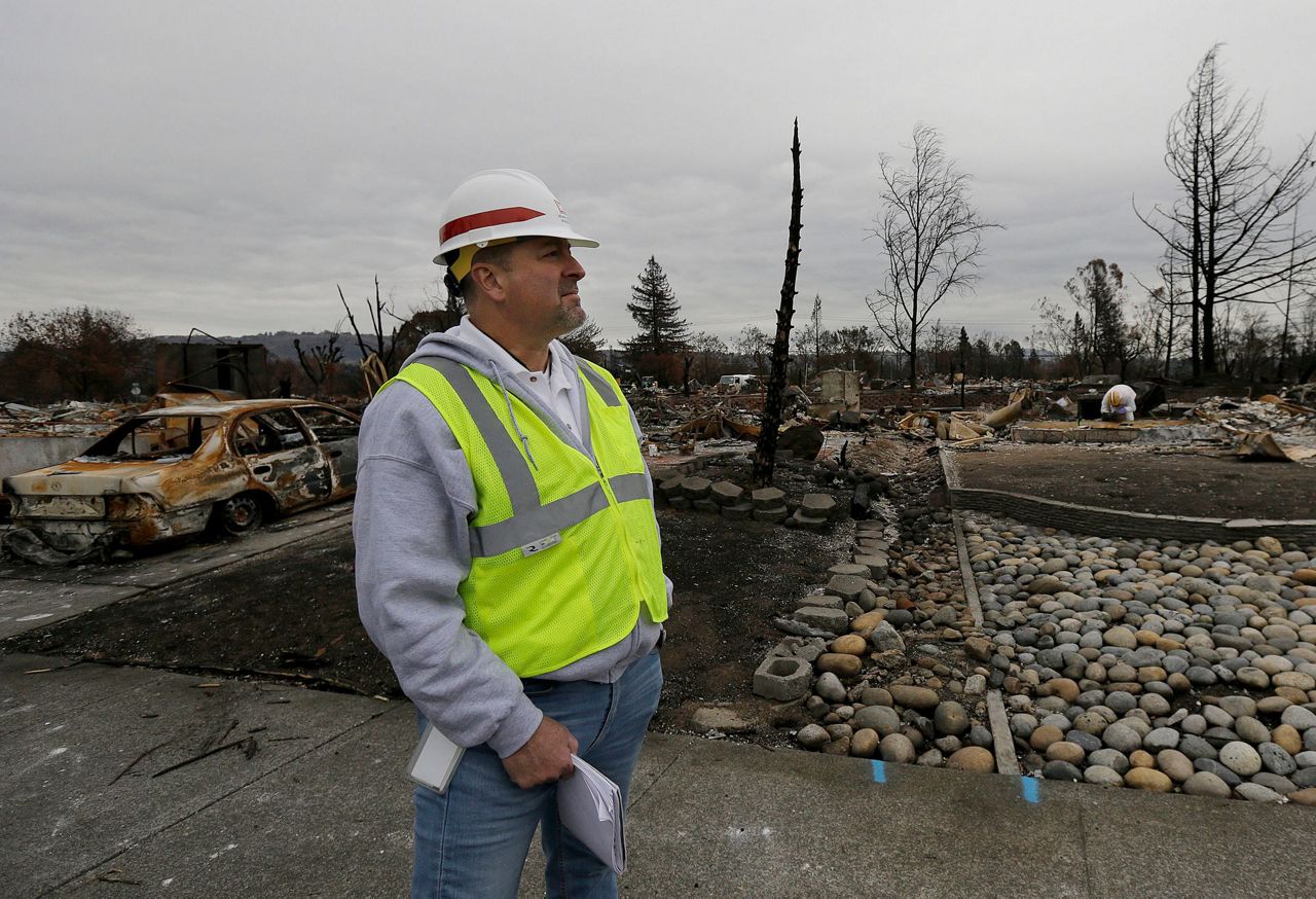 California wildfire victims say cleanup crews add to woes