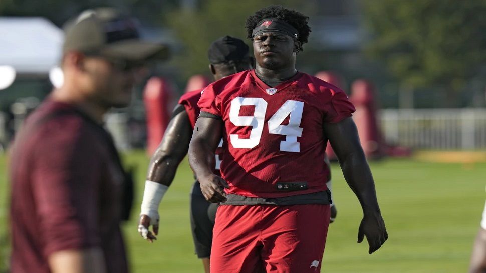 Calijah Kancey strains right calf during camp