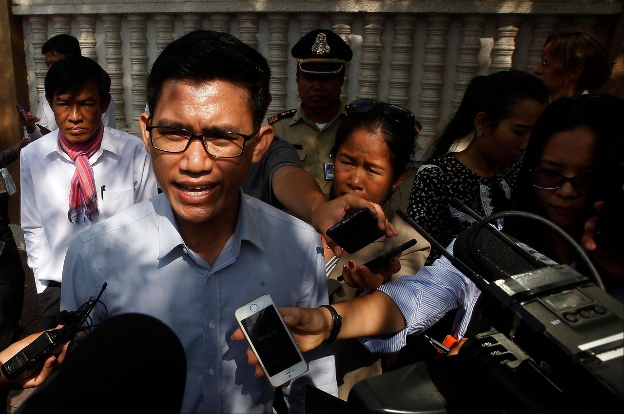 Cambodian judge orders new probe in reporters’ spying case