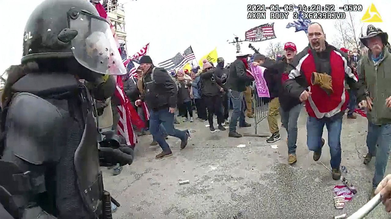 Fierce Capitol attacks on police in newly released videos