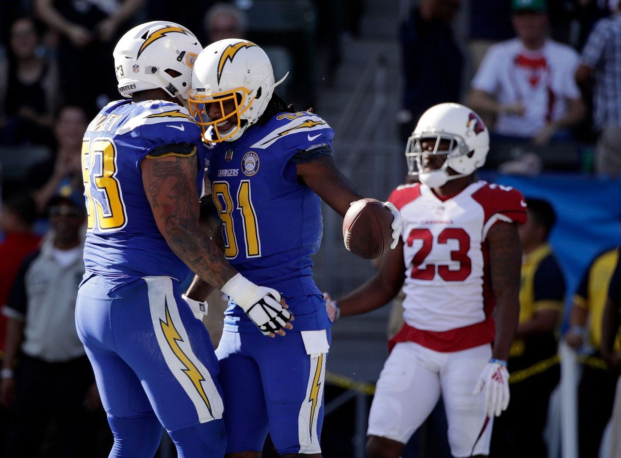 Record day: Chargers' Rivers sets 2 completion marks in win