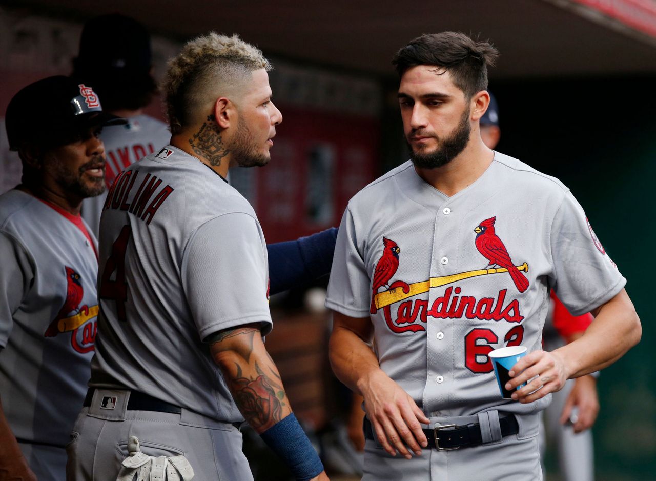 Cards' righty unhittable in debut, Reds rally for 2-1 win