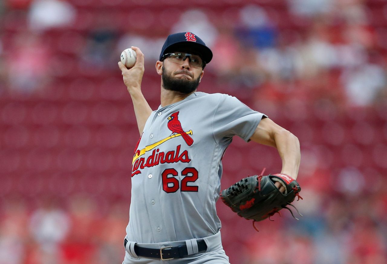 Cards' righty unhittable in debut, Reds rally for 2-1 win