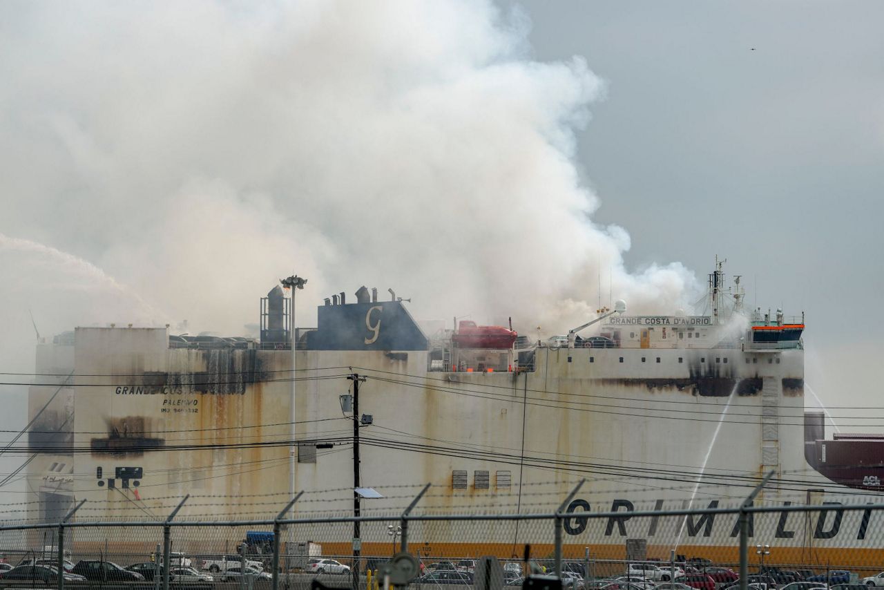 Fatal fire still burns on cargo ship in New Jersey, raising questions ...